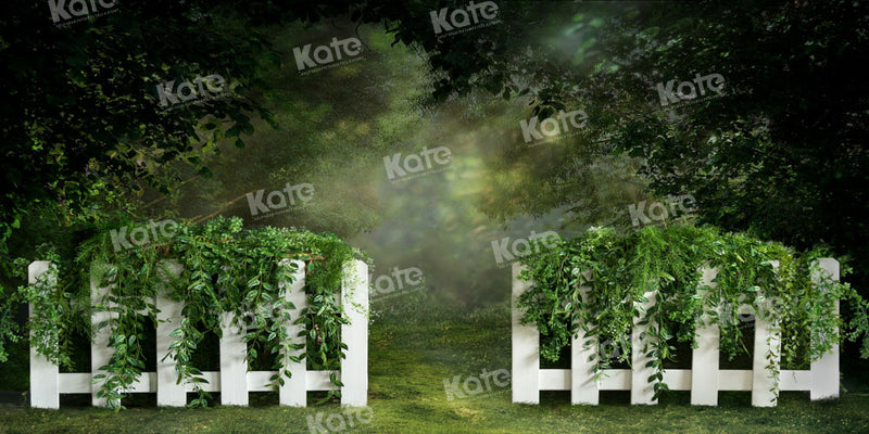 Lush Green Garden White Fence Backdrop