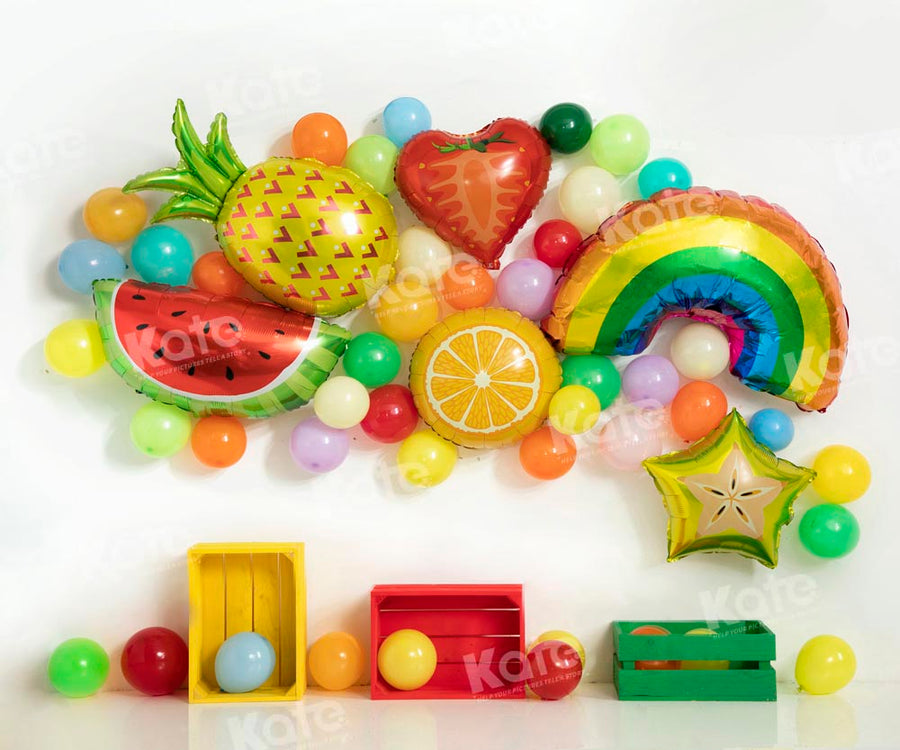 Vibrant Fruit and Rainbow Balloon Backdrop